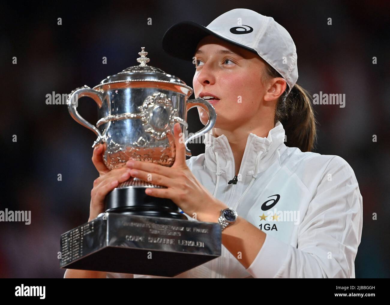 Iga Swiatek of Poland celebrates her victory with the trophy during the ...