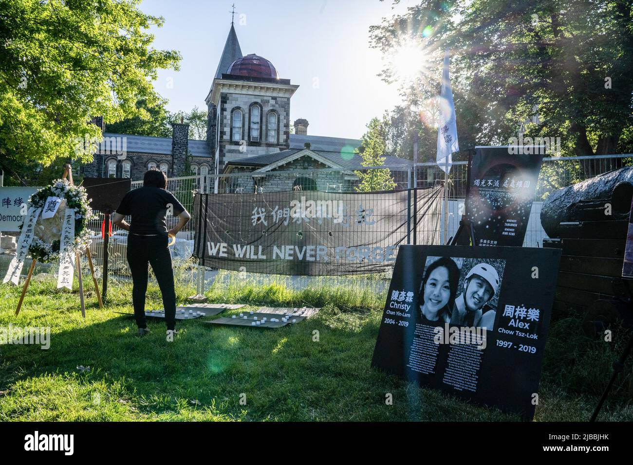 Toronto, Canada. 04th June, 2022. People stand in front of a black ...
