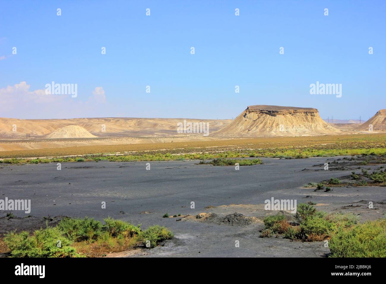 Beautiful black sand in the steppes near the town of Sangachaly ...