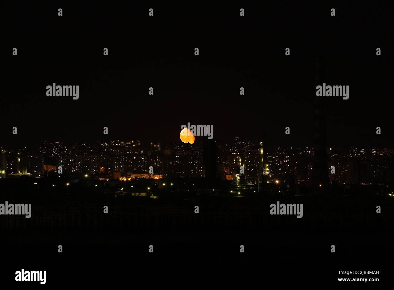 The moon comes out beautifully over the city. Baku. Azerbaijan Stock ...