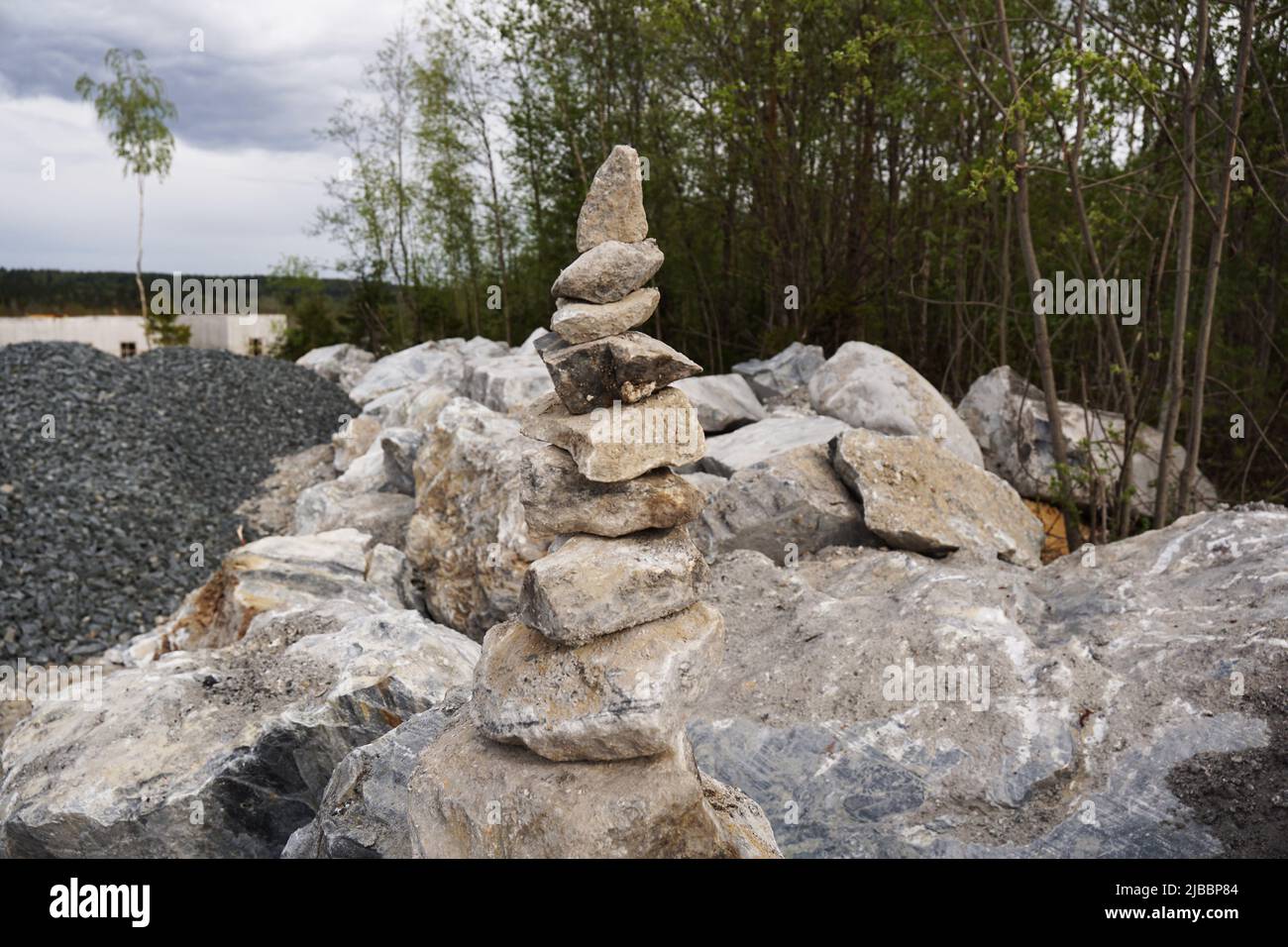 Pyramid made of stones. Piles of pyramids of stones in a former marble ...