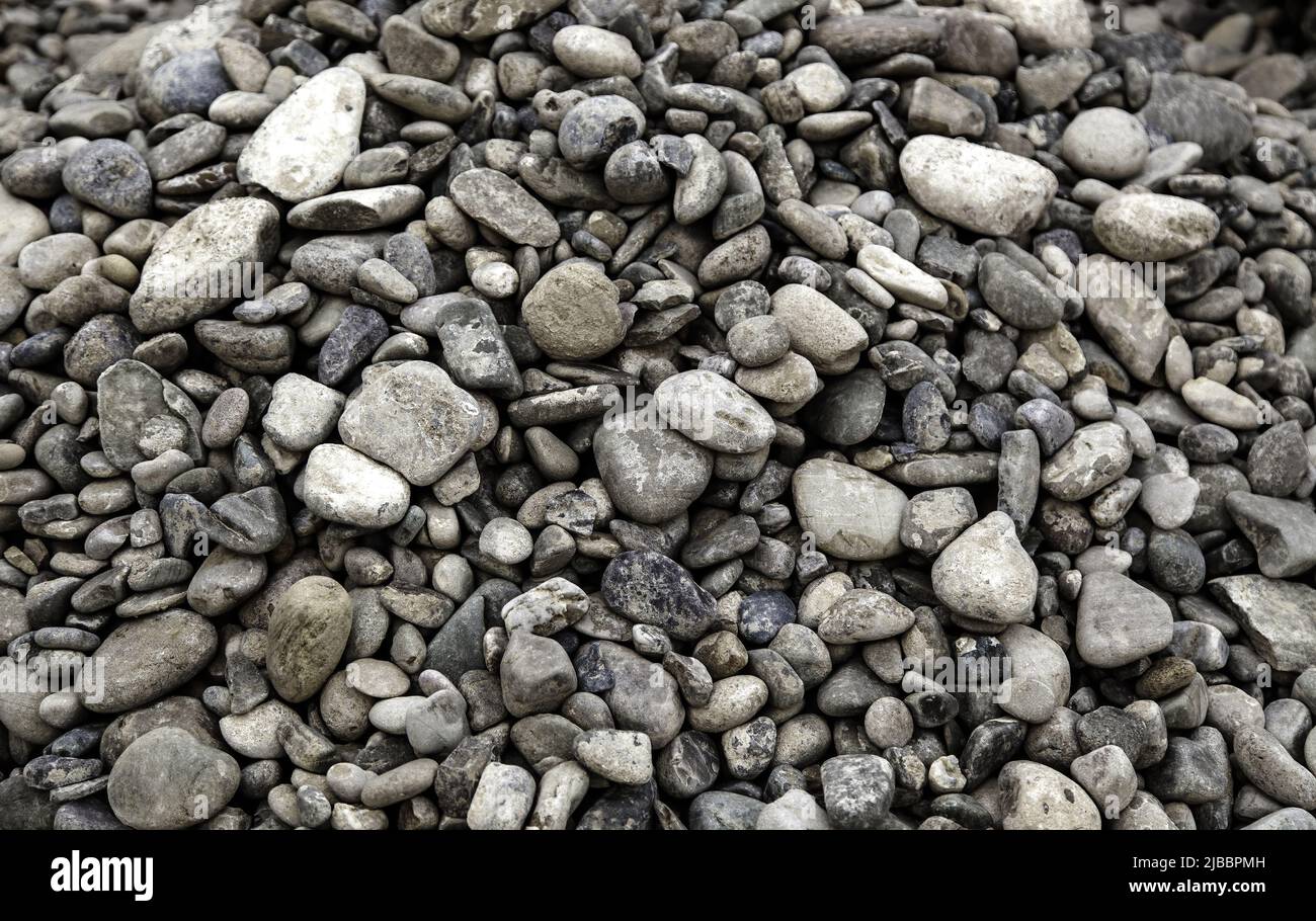Detail of eroded stones on the ground, natural formation Stock Photo ...