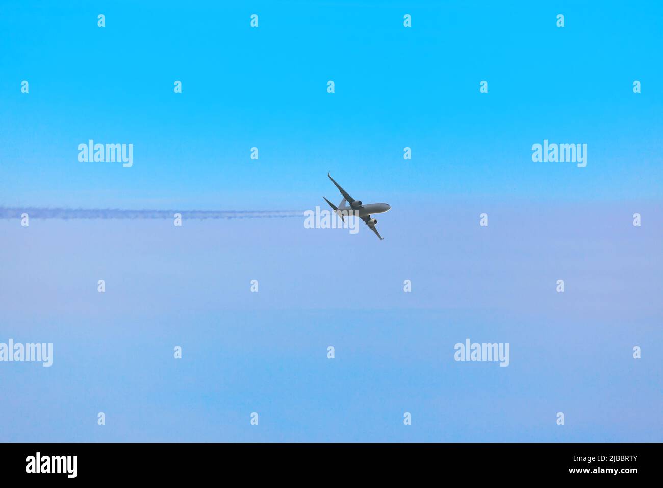 plane in flight view from the another plane . Flying aircraft at blue ...