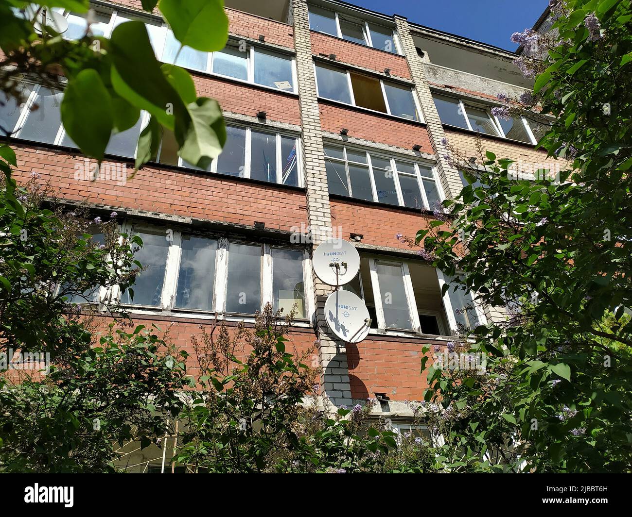 Residential building with satellite TV antennas in Riga's Bolderaja ...