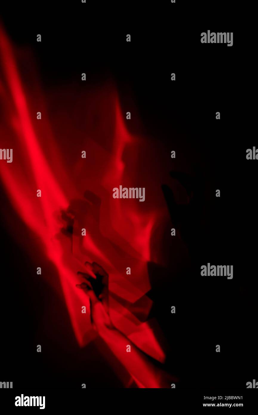 Hands in red light. Abstraction. Shadow theatre, hallucinations Stock ...
