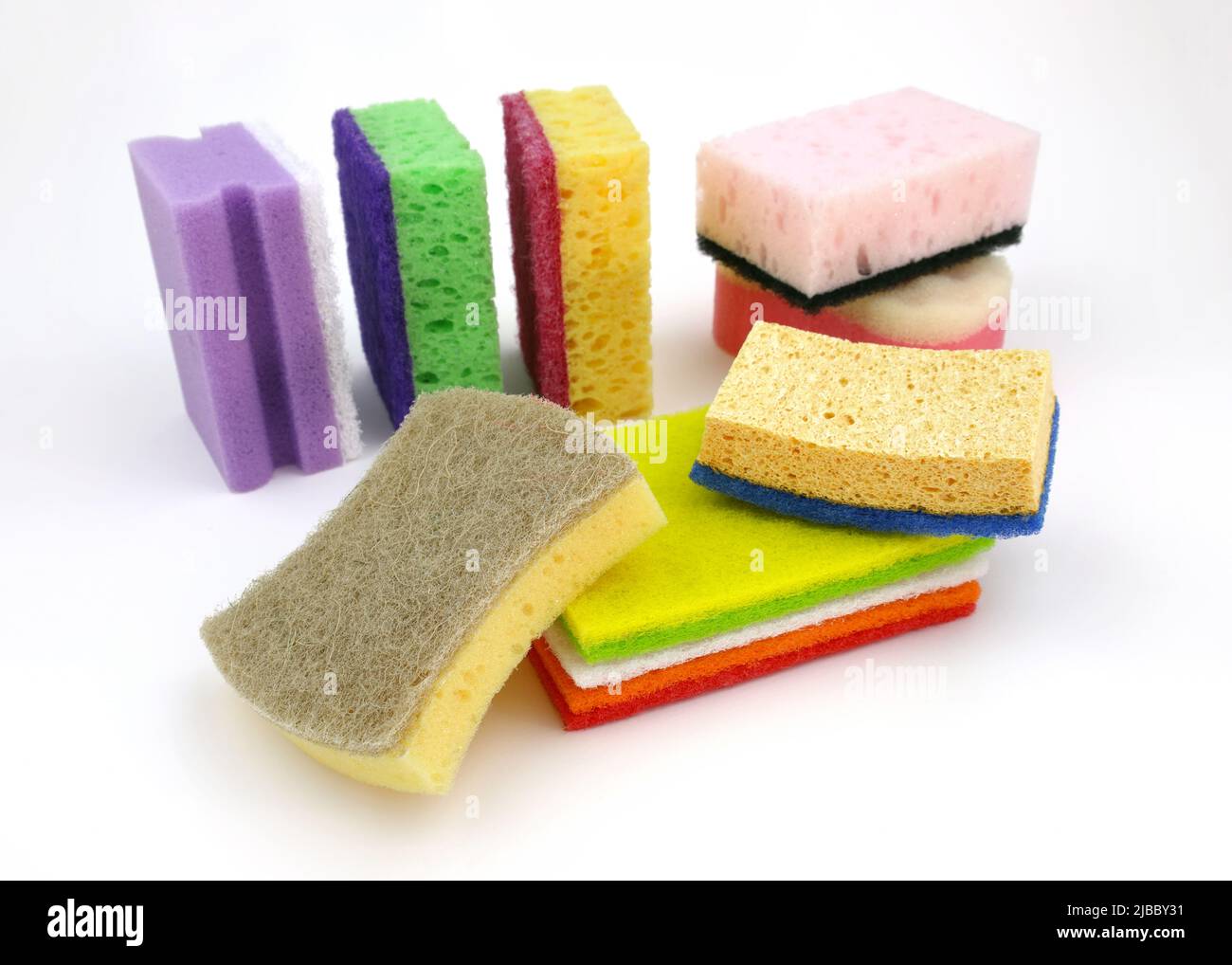 Set of different sponges for washing dishes on a white background ...