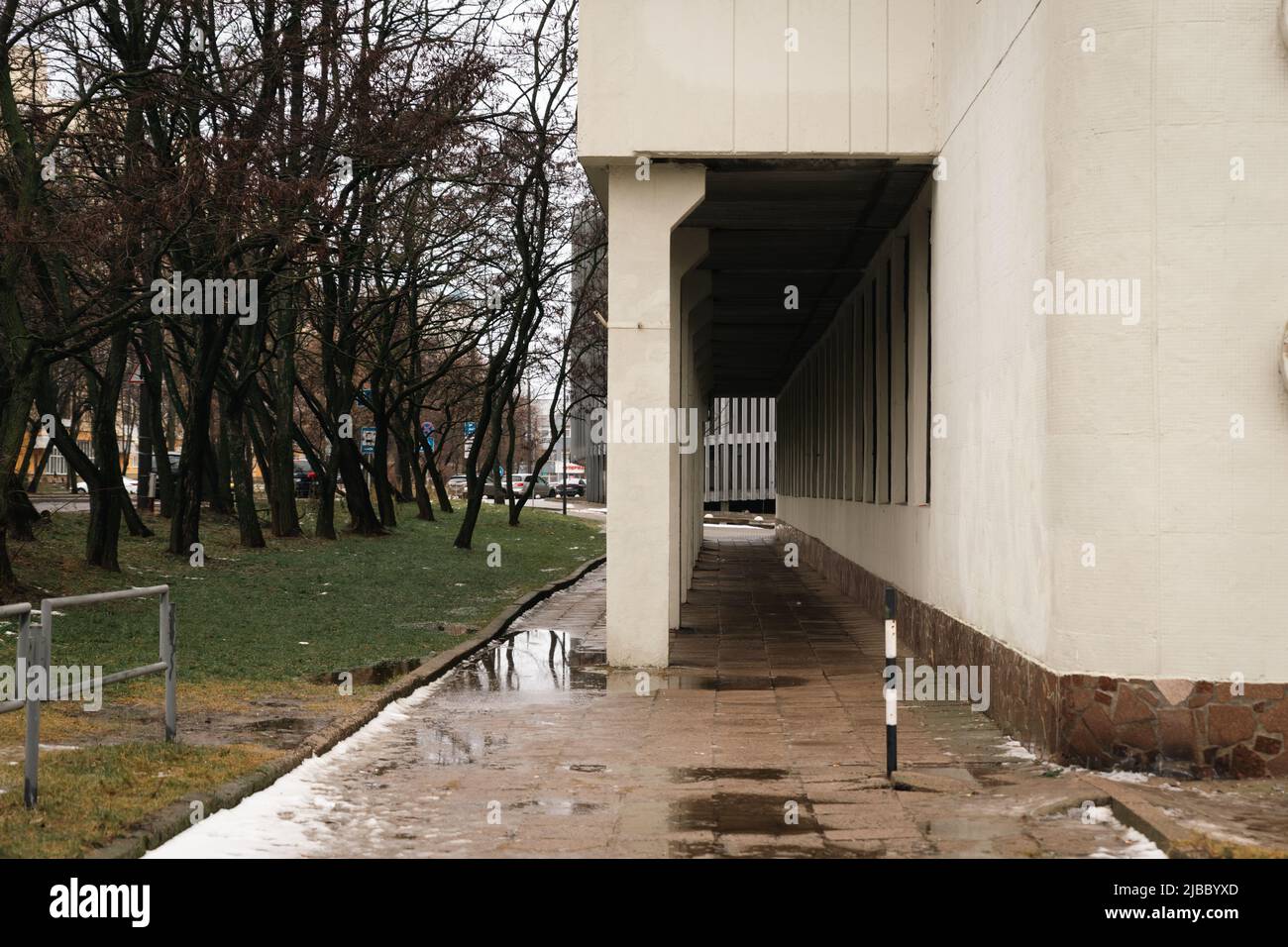 research institute concrete factory wall with holes and tunnel autumn ...