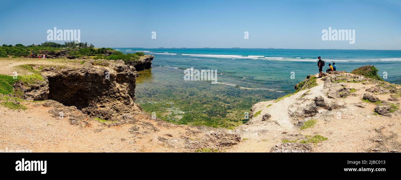 Rocks and hidden sand beaches by the waters of the Indian Ocean at Coco ...
