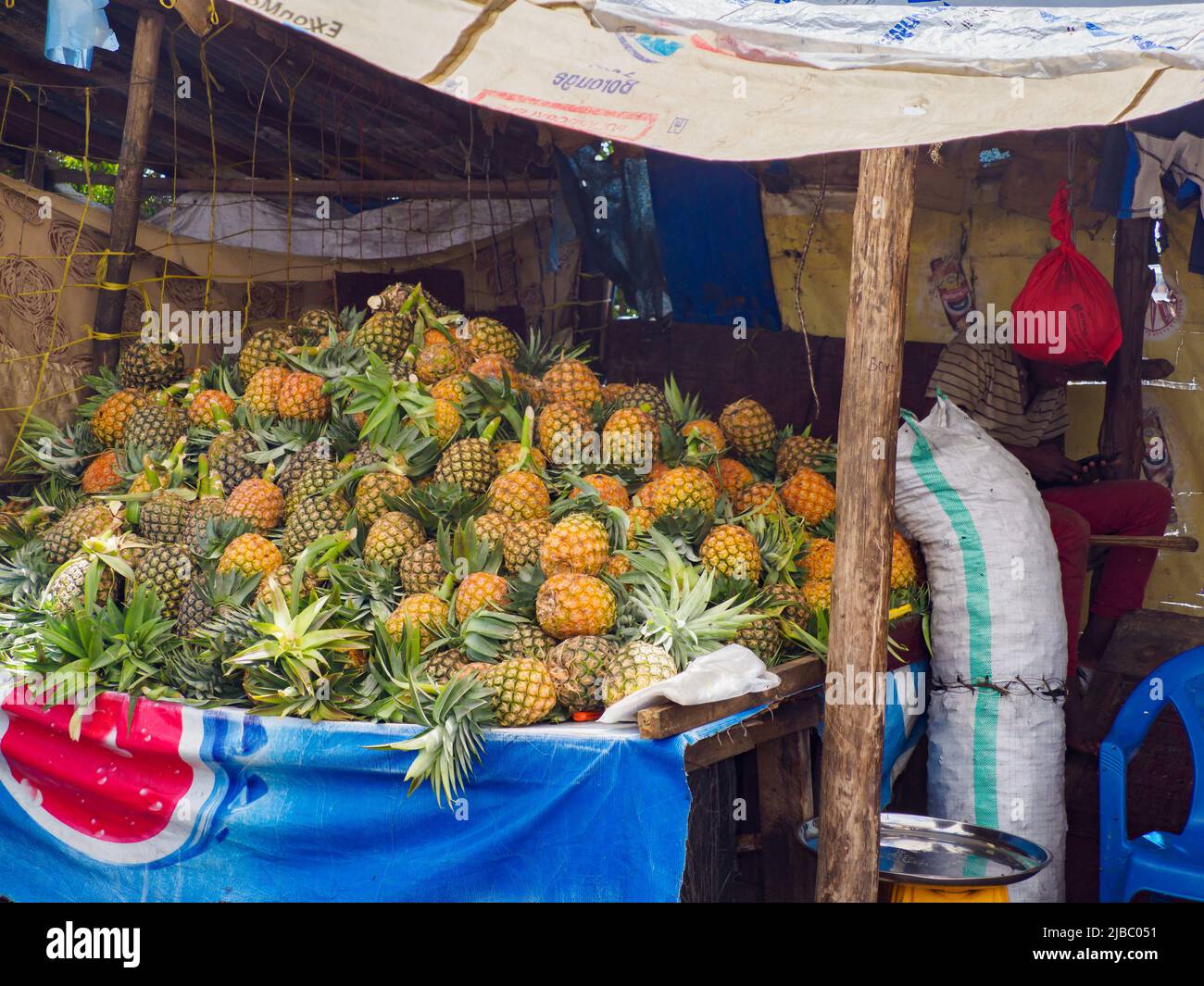 Fresh juicy pineapples at a local bazaar in Tanzani, Africa Stock Photo ...