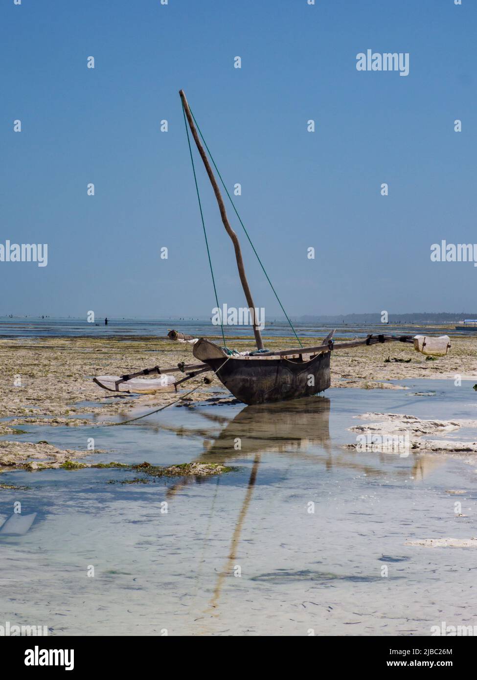 Zanzibar, Tanzania - January 2021: Traditional dhow boat aground during ...