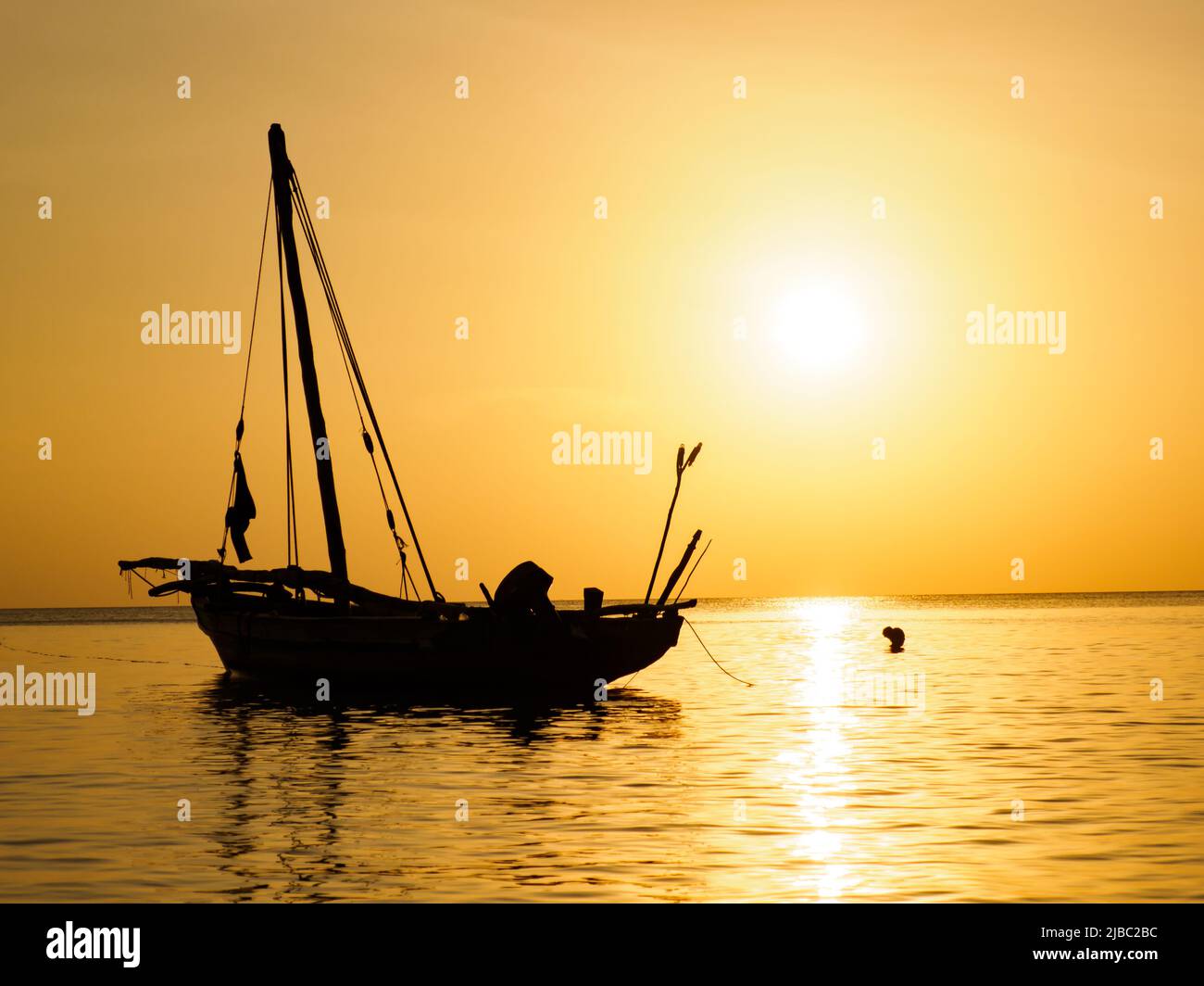 Traditional dhow boat during sunset time., Zanzibar, Tanzania, Africa ...