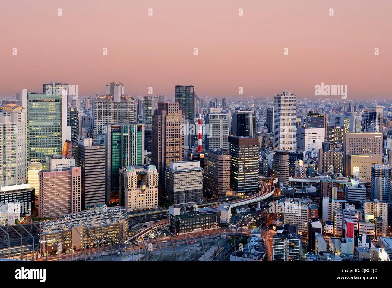 Japan. Kansai. Osaka. The business financial district at dusk Stock ...