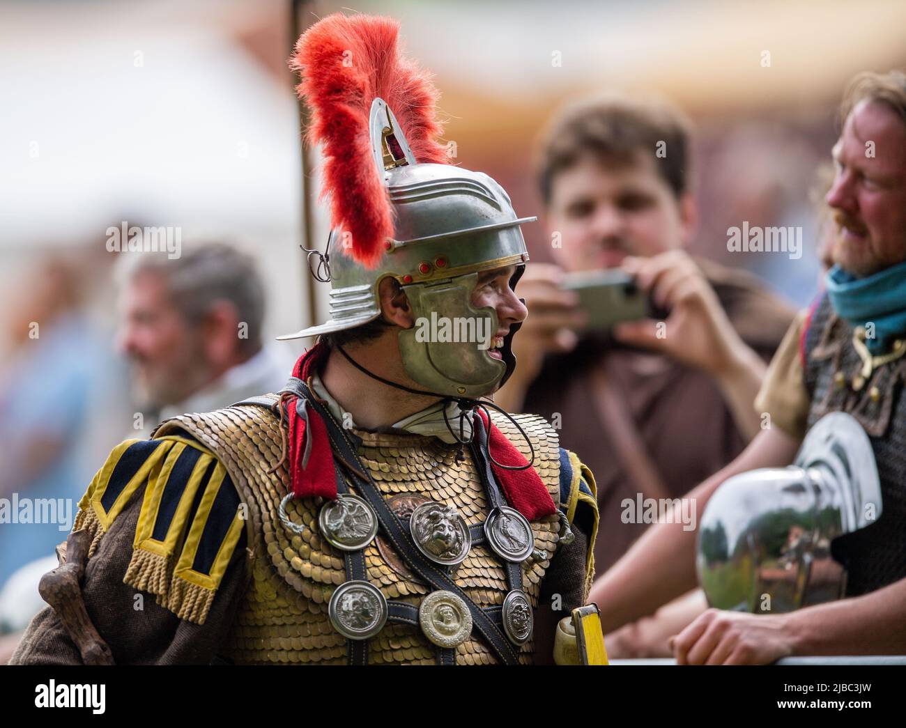 Bramsche, Germany. 05th June, 2022. A performer in the costume of a ...