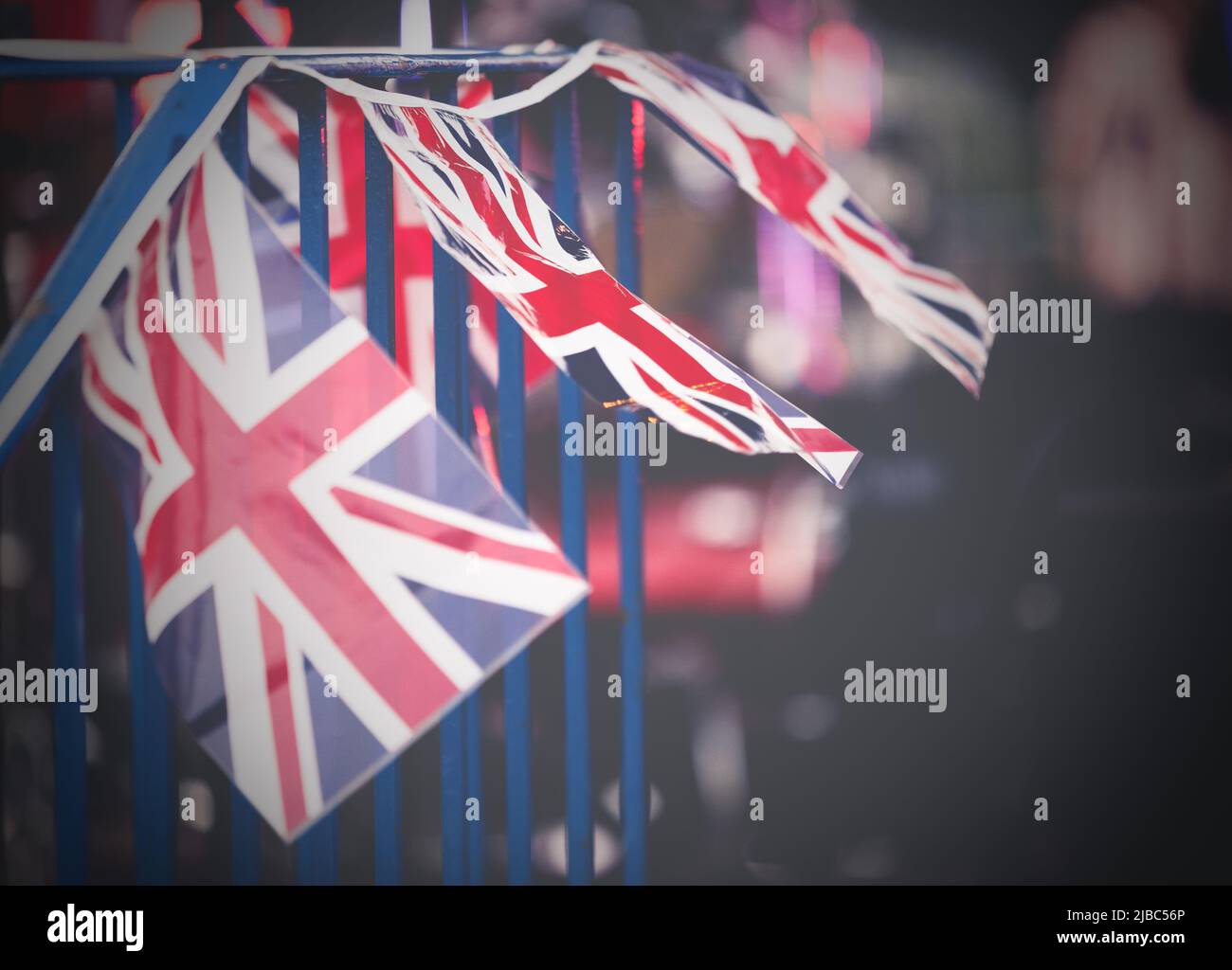 Railing covered with union jack bunting on the band stand at Garth Park ...