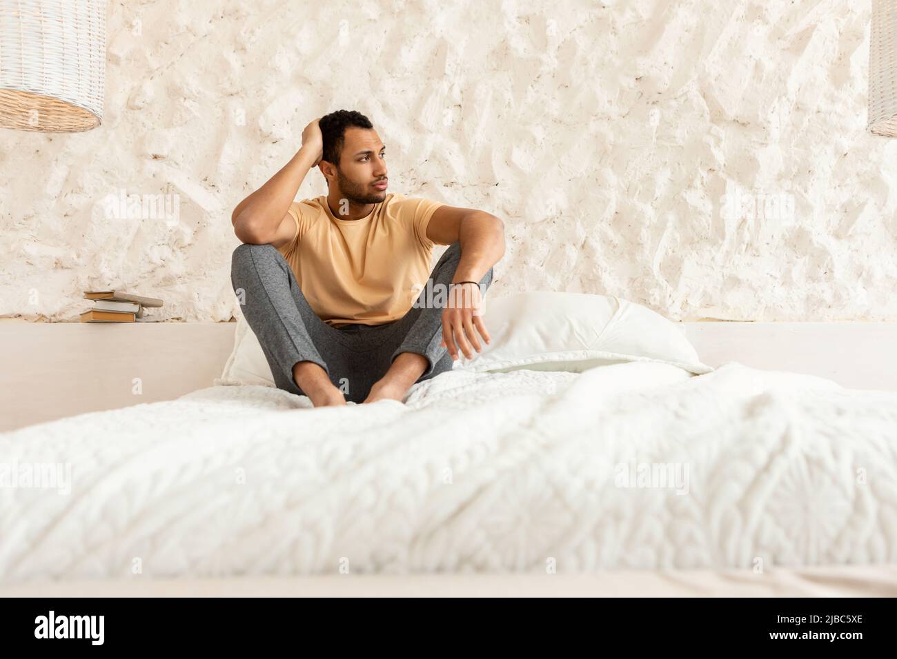 Depressed Arabic Man Having Depression Sitting In Bed Indoor Stock ...