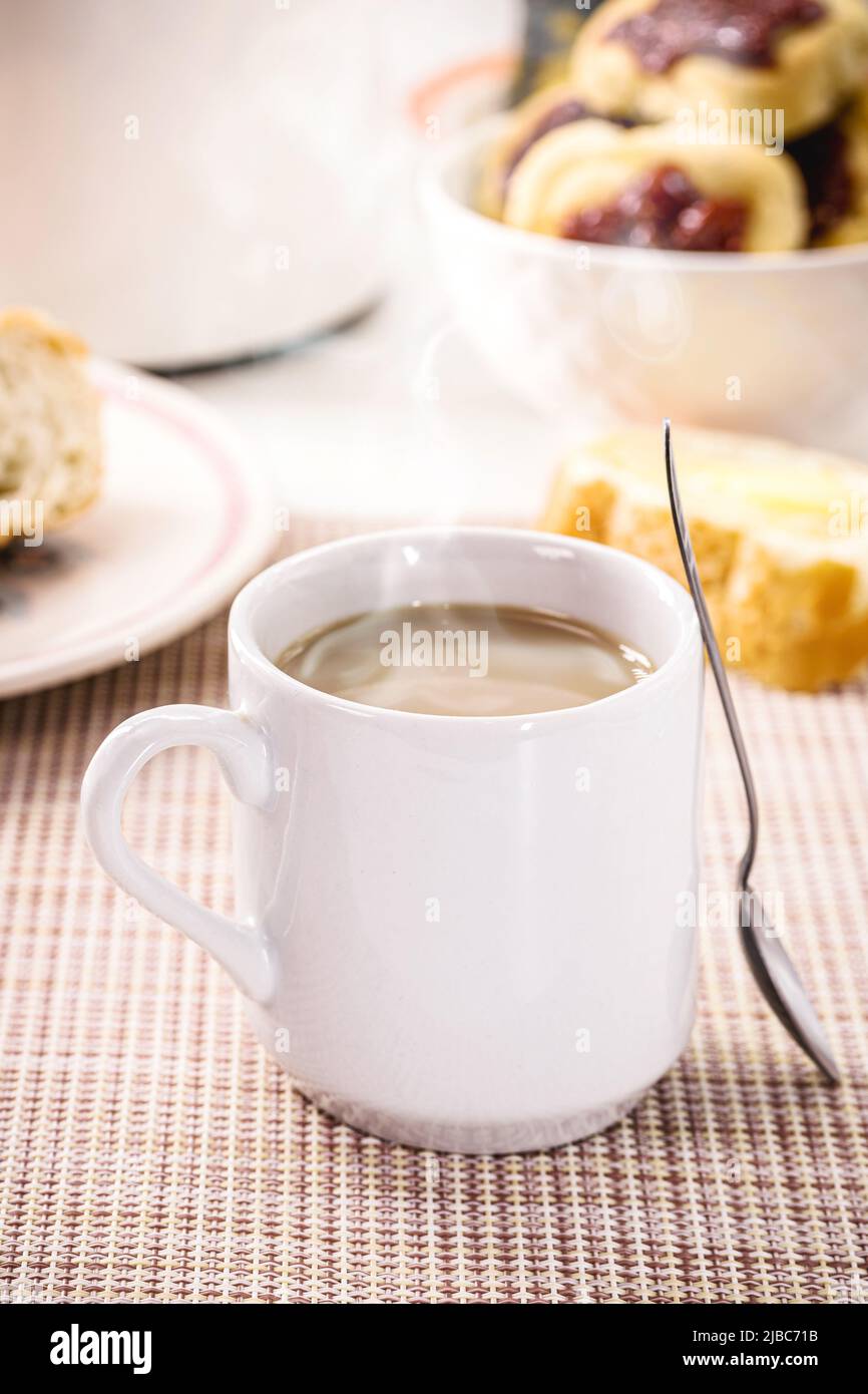 milk with coffee, traditional Brazilian breakfast drink, served hot ...