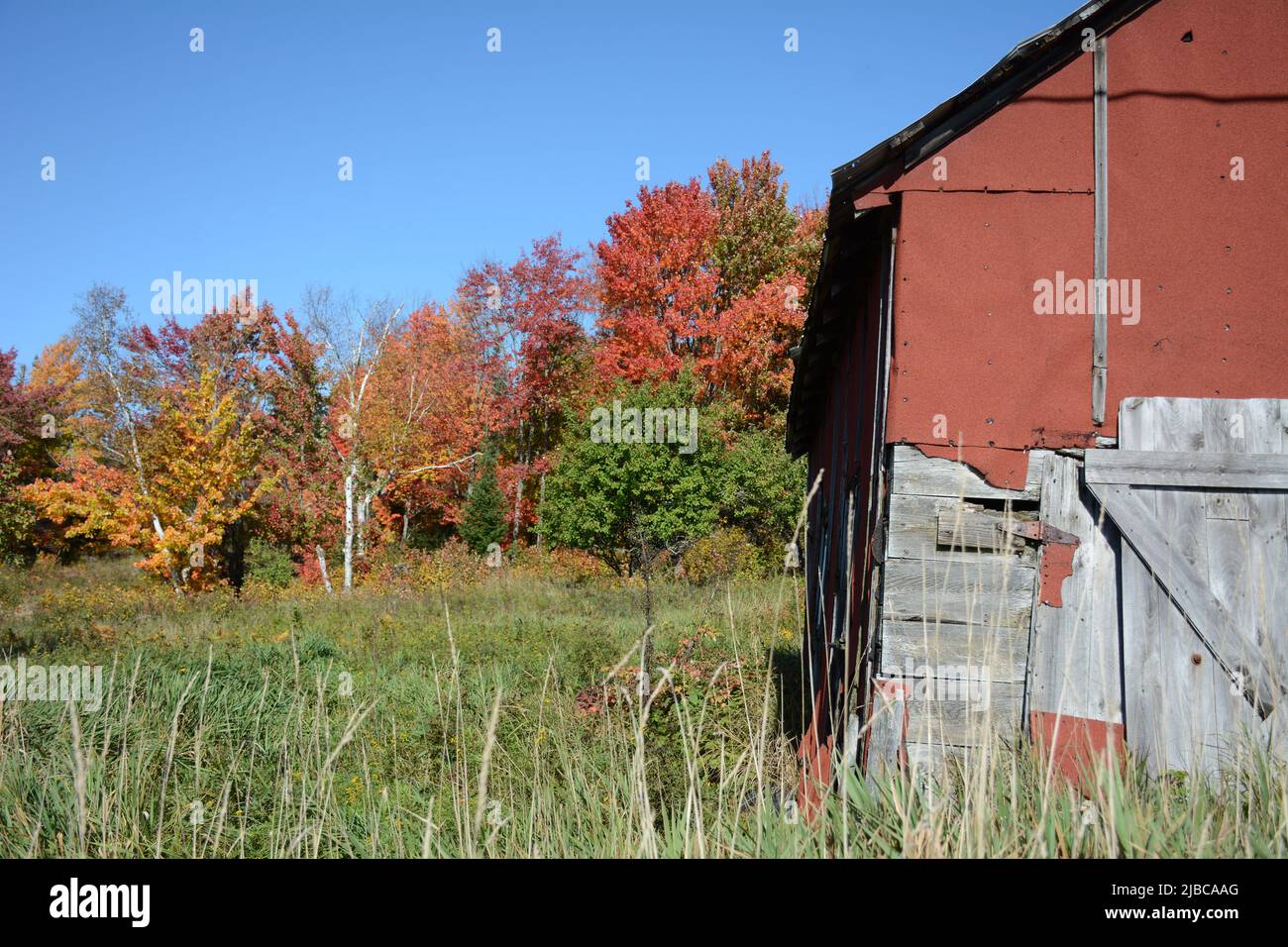 Autumn in country setting with country road Stock Photo - Alamy