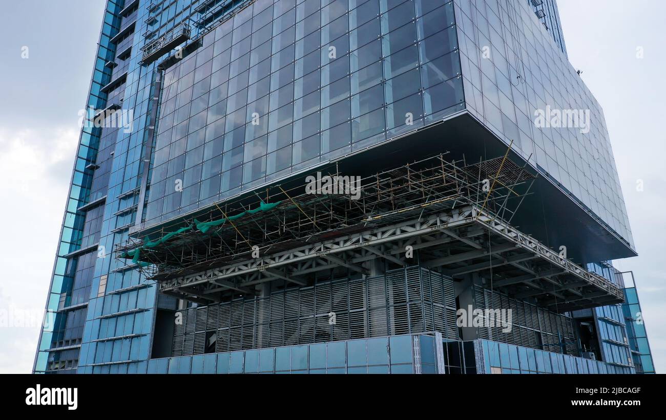 Close-up of high-rise buildings under construction, exterior ...