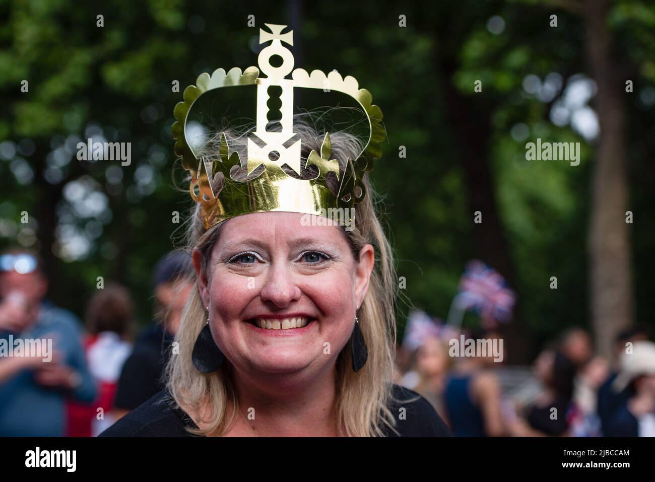 Party reveler is adorned in a Crown during the Queen Elizabeth II ...