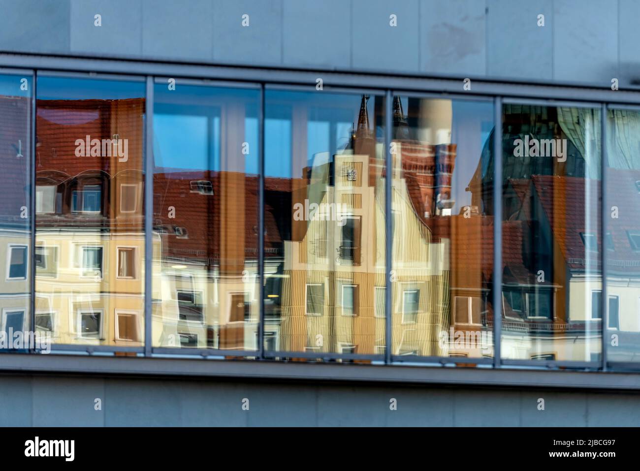 Berlin, March 25th 2019: Reflections in an office block in Berlin-Mitte ...