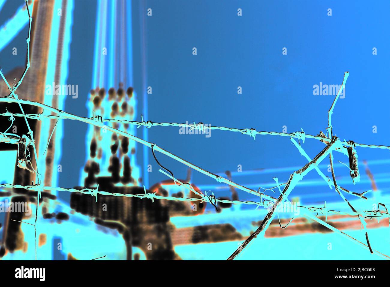 Razor sharp barbed wire fence protecting the industrial area in a ...