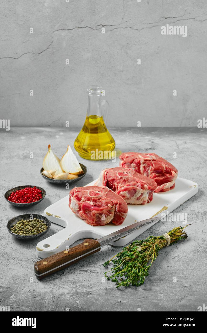 Raw fresh lamb saddle cut on sections Stock Photo - Alamy