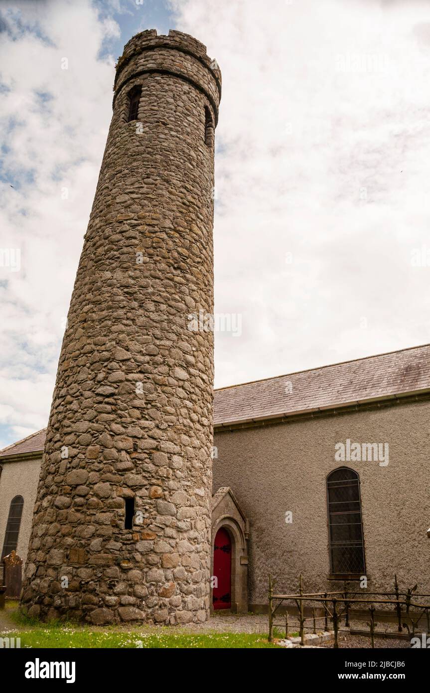 Pointed arched door by the Castledermot Round Tower at St. James Church ...