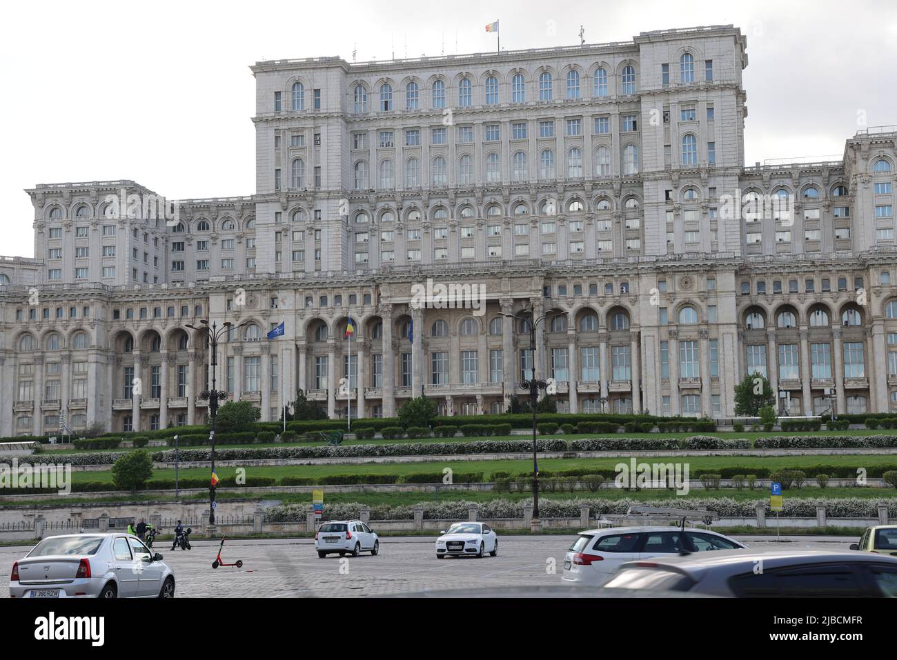 NATO, Romanian & EU flags in front of the House of the people in ...