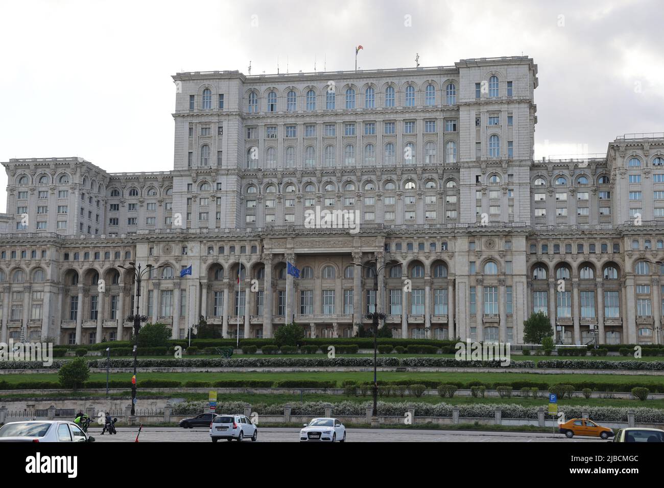 NATO, Romanian & EU flags in front of the House of the people in ...