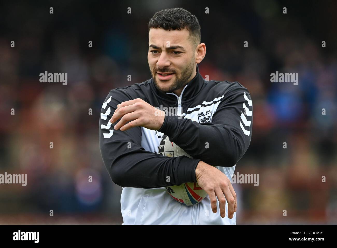 Jake Connor (1) of Hull FC stretches during pre match warm up Stock ...