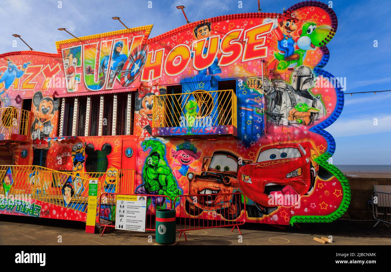 The fun fair at Hunstanton on the north coast of Norfolk on a clear ...