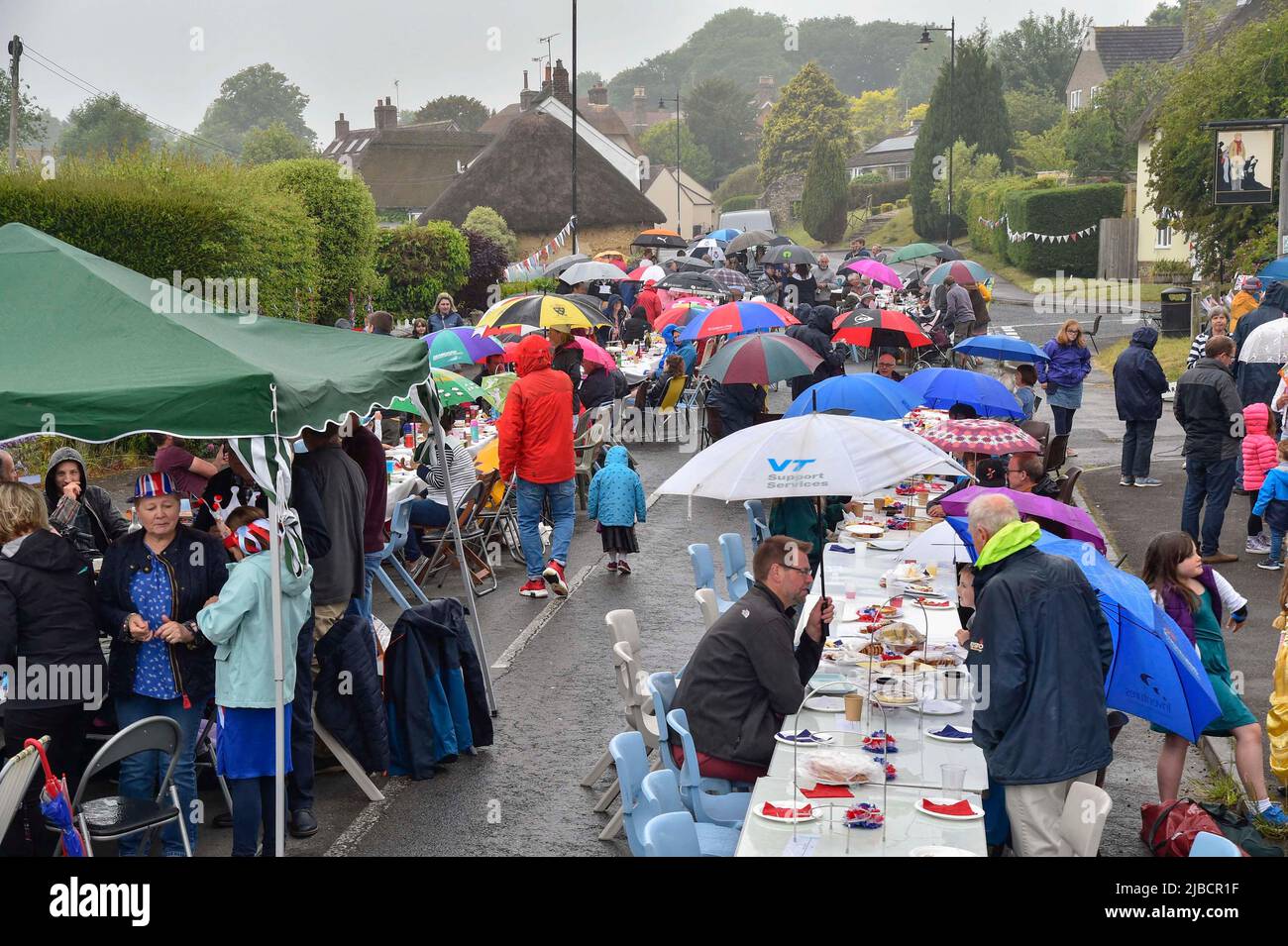 Tolpuddle, Dorset, UK. 5th June 2022. UK Weather: Residents brave the ...