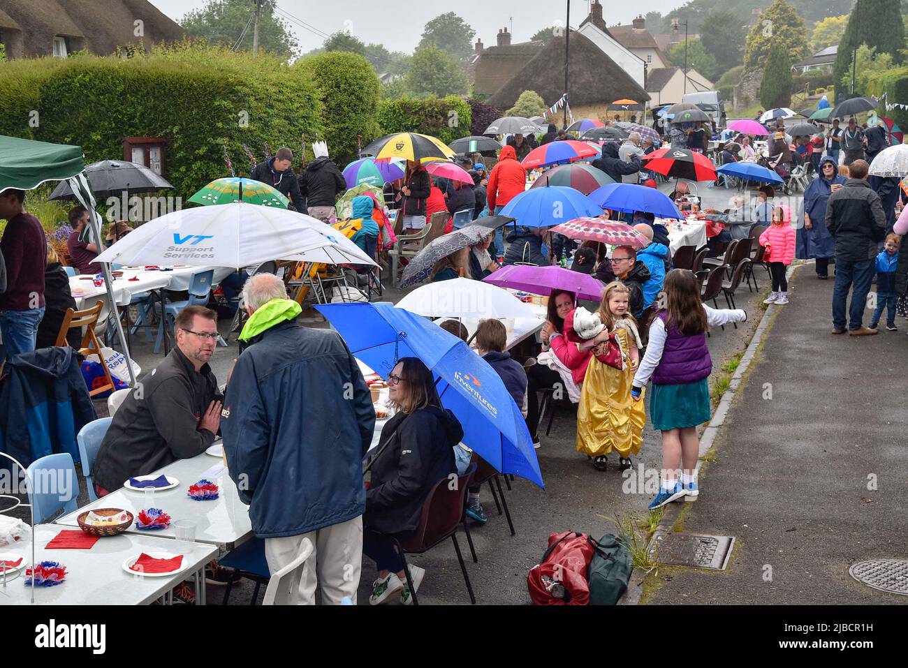 Tolpuddle, Dorset, UK. 5th June 2022. UK Weather: Residents brave the ...