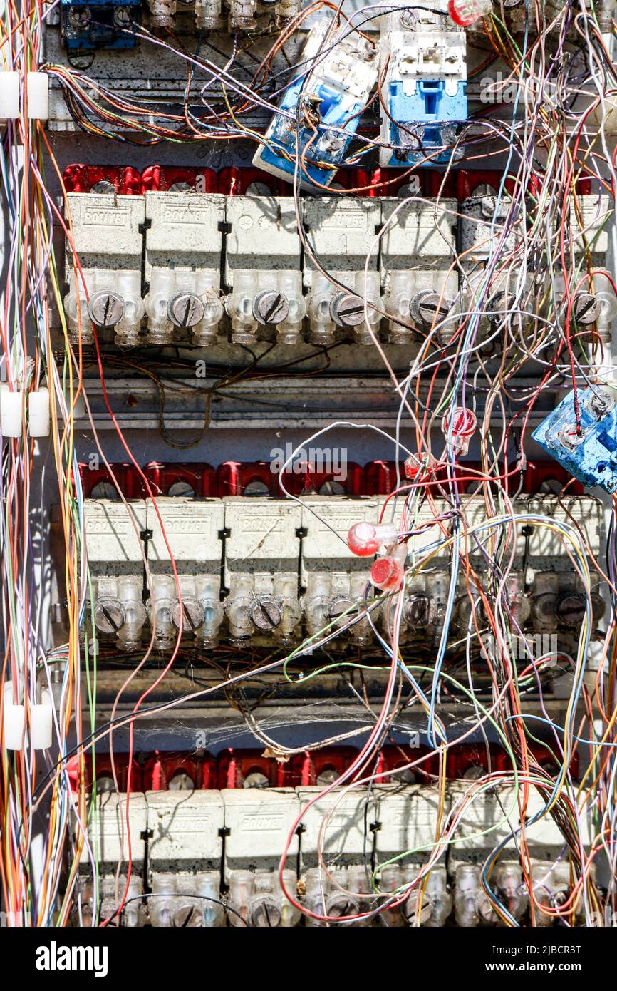 Mess in a telephone junction box Stock Photo - Alamy