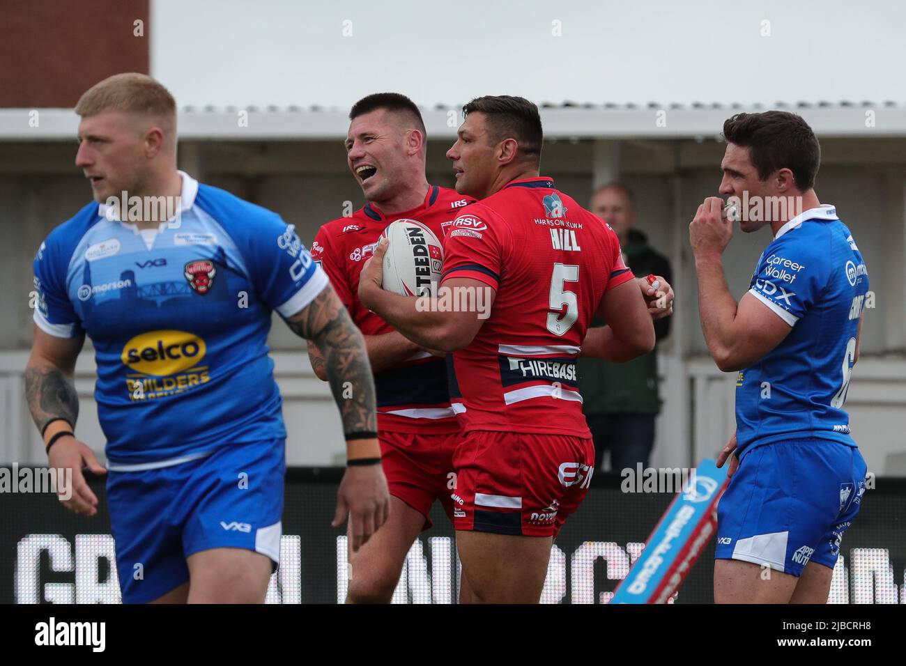 Ryan Hall #5 of Hull KR celebrates his try with Shaun Kenny-Dowall and ...