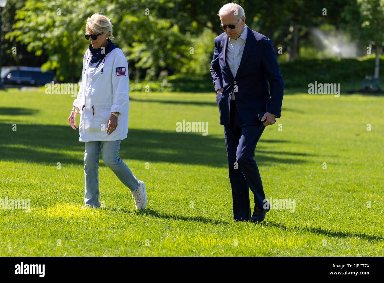 US President Joe Biden and First Lady Jill Biden walk on the South Lawn ...