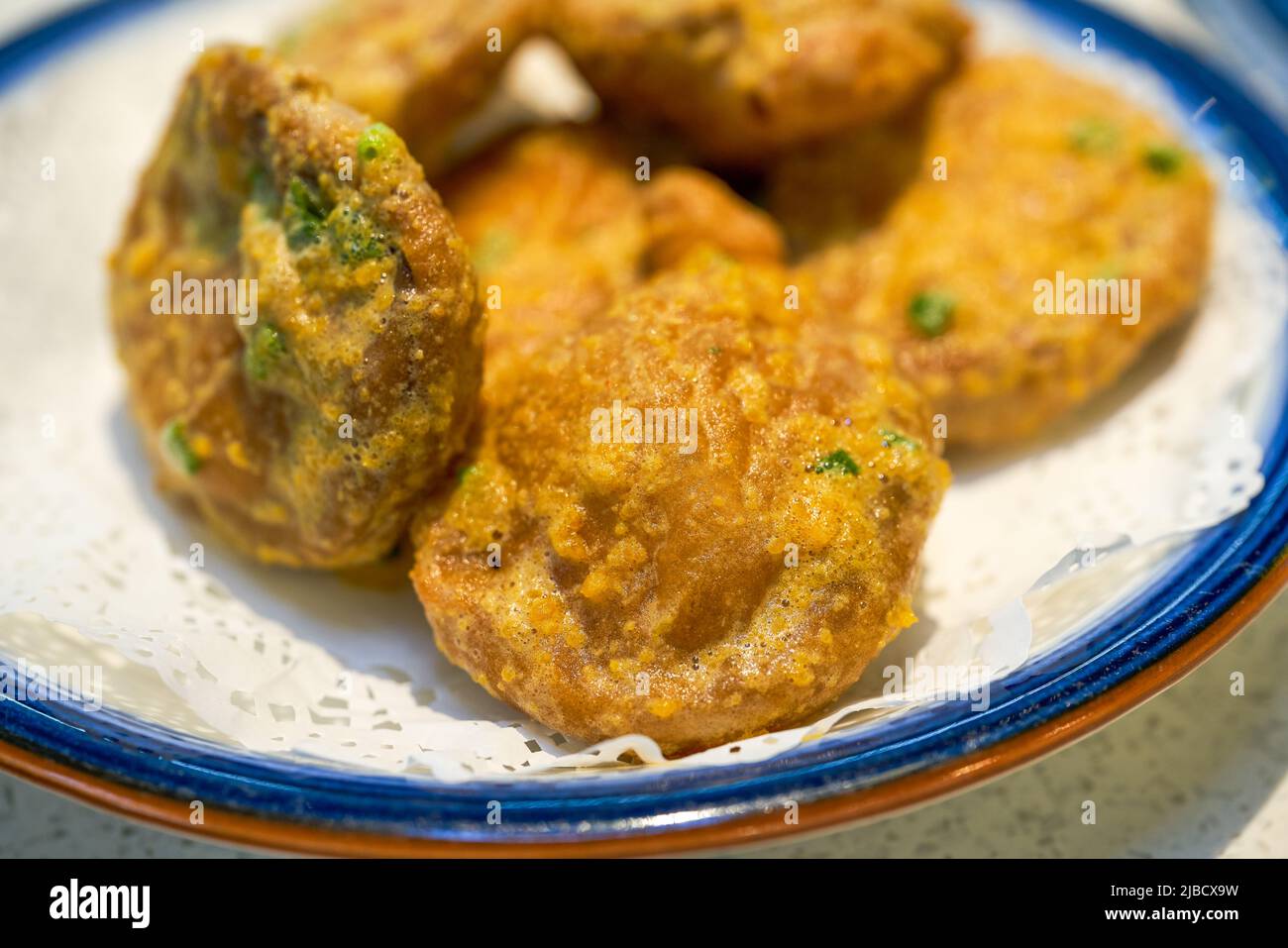 A delicious Chinese dish, fried pork and lotus root cake Stock Photo ...