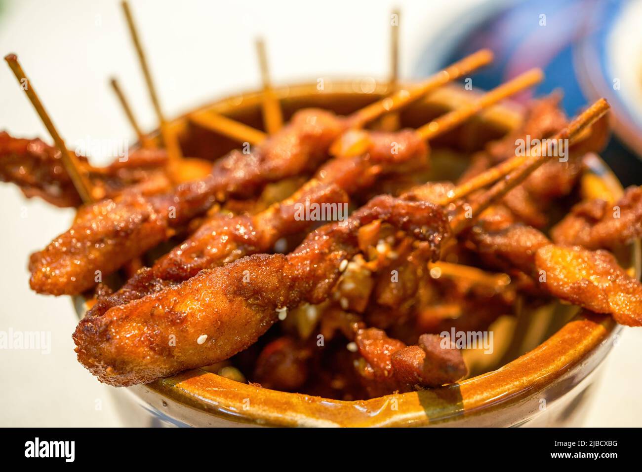 A Delicious and Crispy Fried Rabbit Skewers Stock Photo - Alamy
