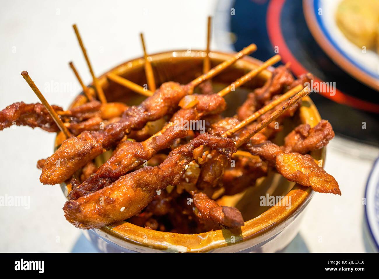 A Delicious and Crispy Fried Rabbit Skewers Stock Photo - Alamy