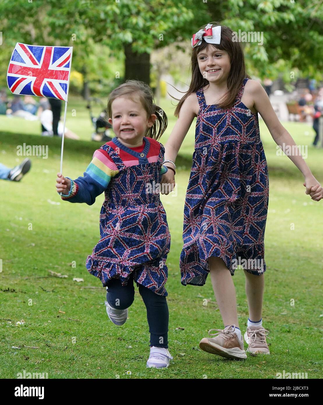 L-r Albie Jarvis(4) and Mari Scougal(9) run through Princess Street ...
