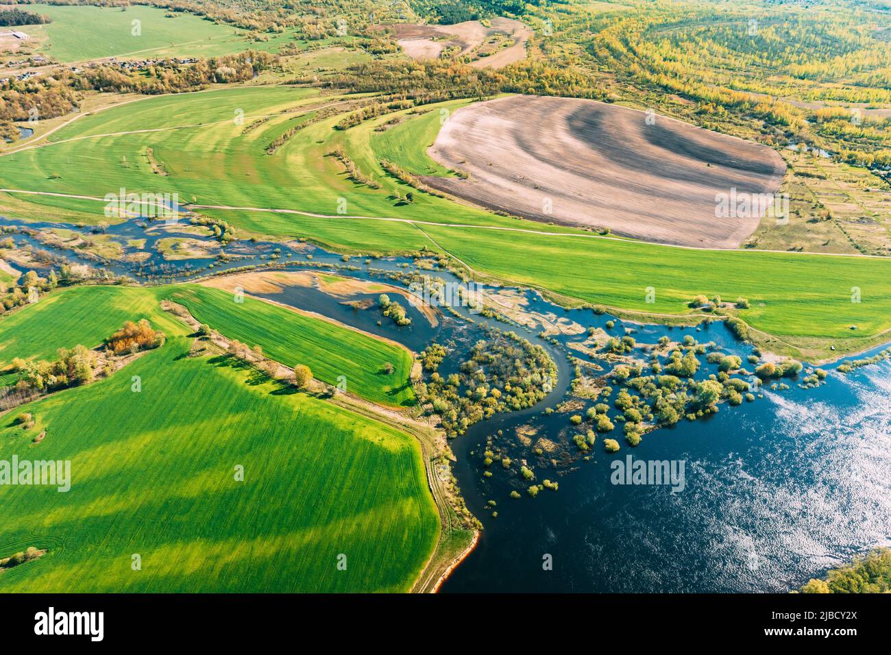 Aerial View Green meadows And River Landscape In Sunny Spring Summer ...