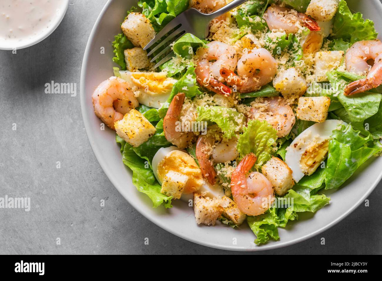 Shrimp Salad. Seafood Caesar Salad with prawns, parmesan cheese and ...
