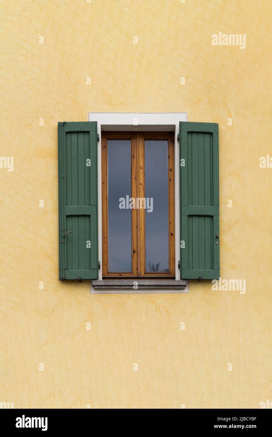 Traditional window of Italian house with closing doors in wood. High ...