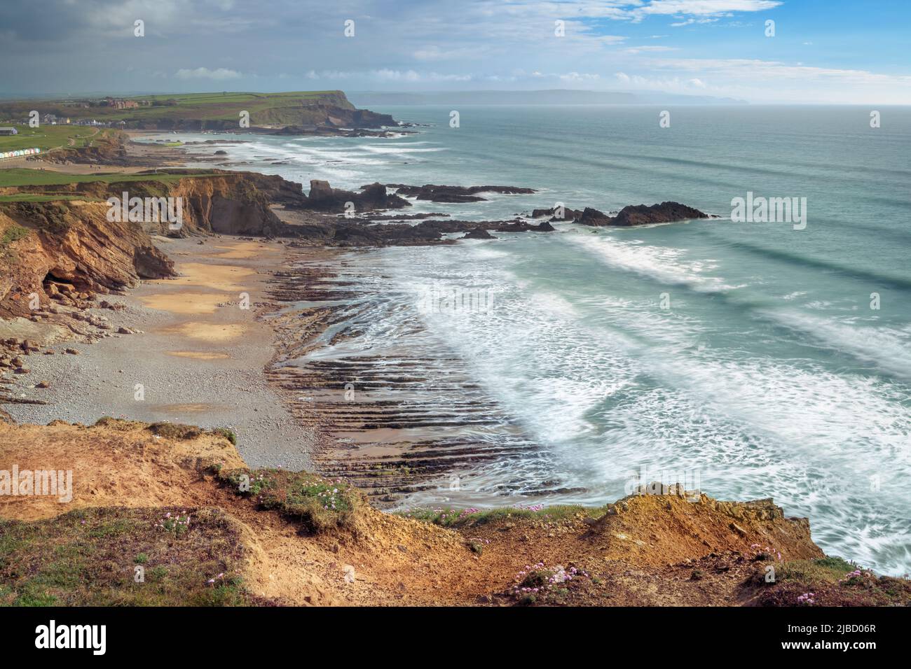 The South West Coastal footpath winds its way along the clifffs ...