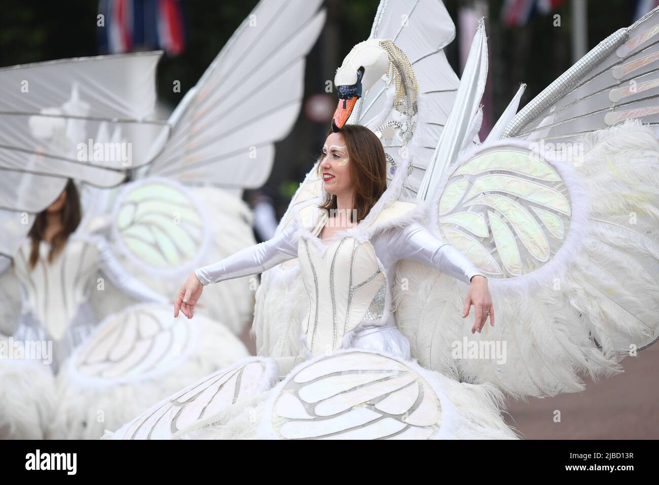 EDITORIAL USE ONLY A participant dressed as a swan during the Platinum ...