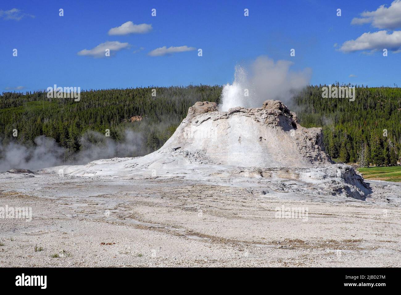 Small geyser erupting in the Old Faithful geyser area in the ...