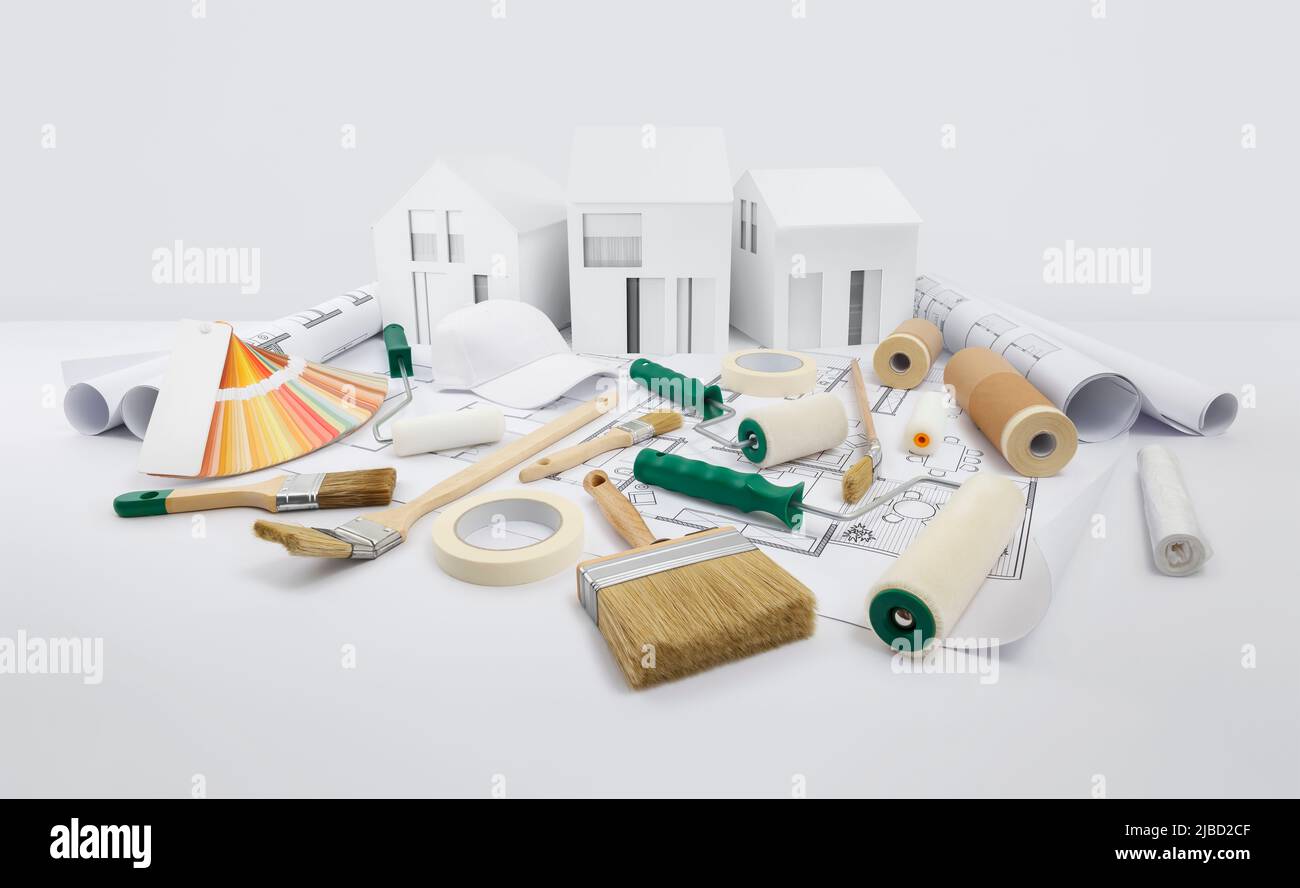 house painter tools, brushes, paint rollers, paper masking tape and ...