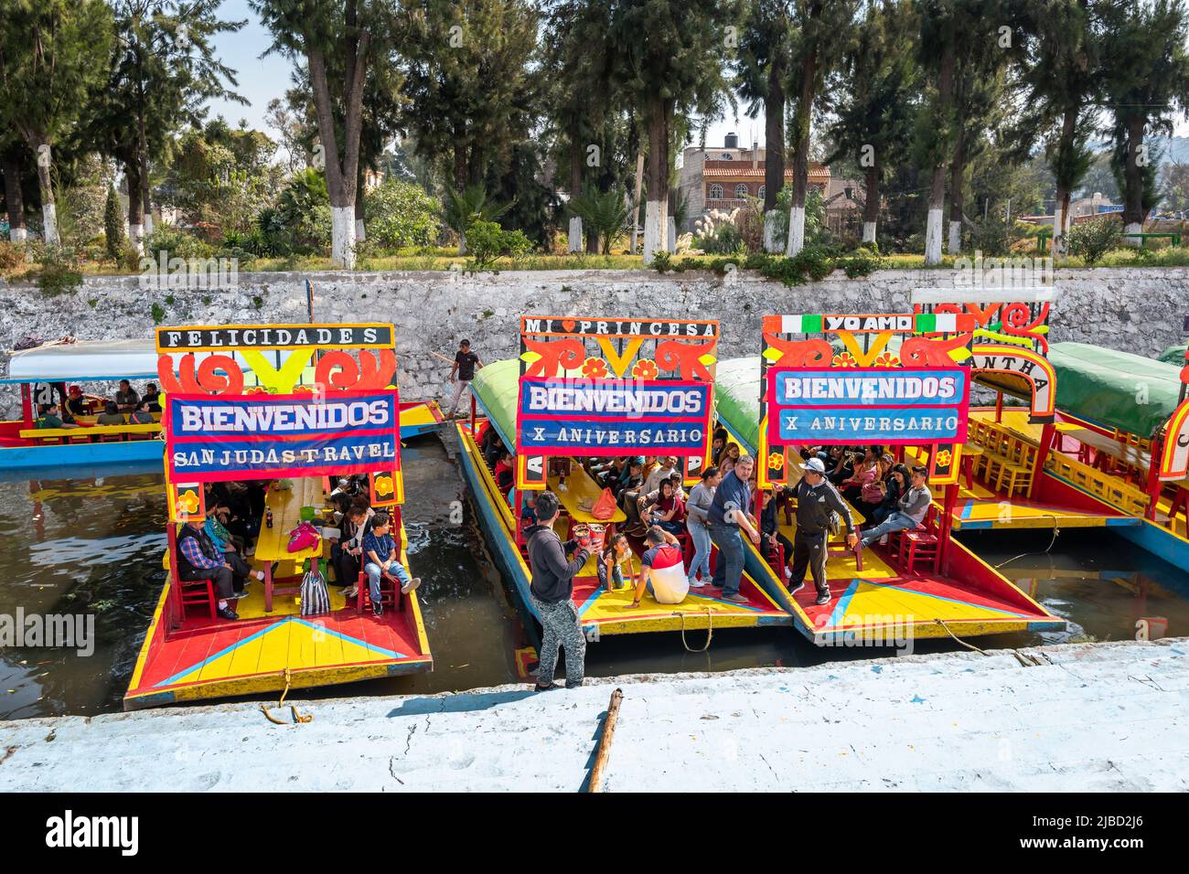 Mexico City, January 19th 2019: Families enjoying a traditional day out cruising in flat ...
