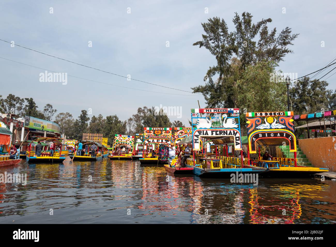 Mexico City, January 19th 2019: Families enjoying a traditional day out cruising in flat ...