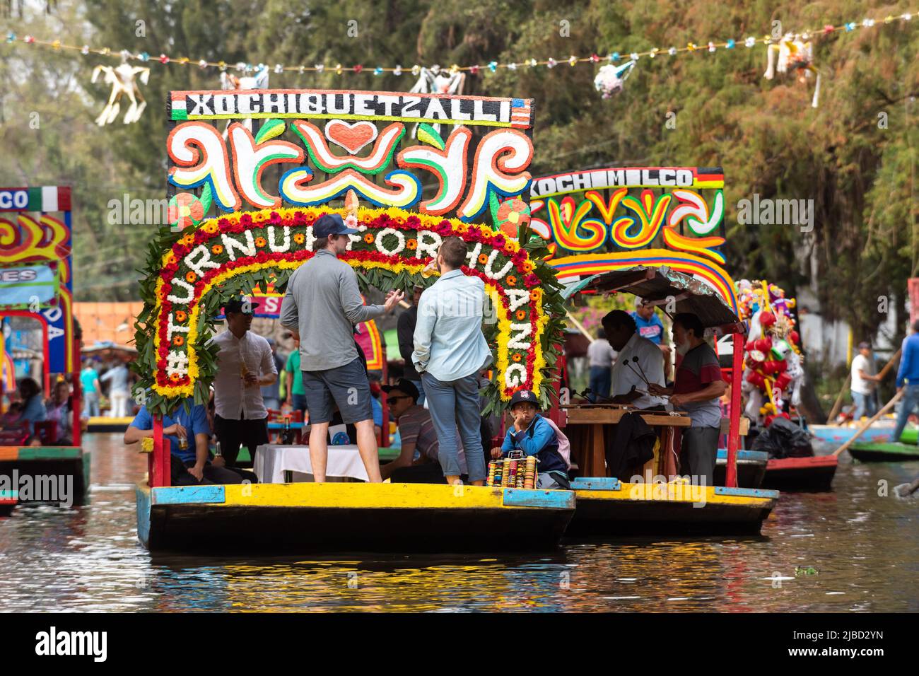 Mexico City, January 19th 2019: Families enjoying a traditional day out cruising in flat ...